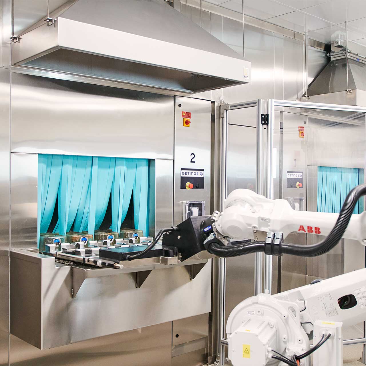 Robotic Cage Handling System for Tunnel Washers