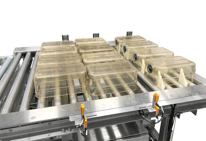 Robotic Cage Handling System for Tunnel Washers - Getinge