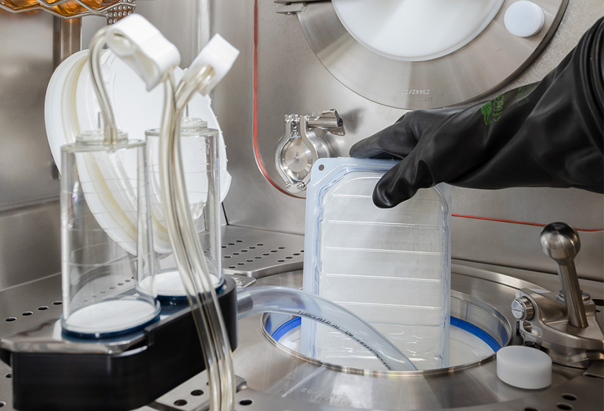 Cost-effective rigid-wall isolator for common aseptic applications